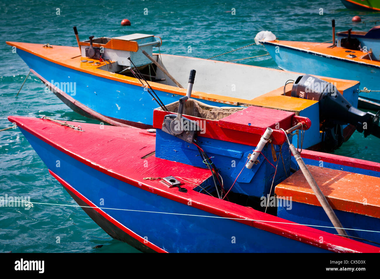 Colourful fishing boats moored at Avatiu Harbour, Avatiu, Rarotonga ...