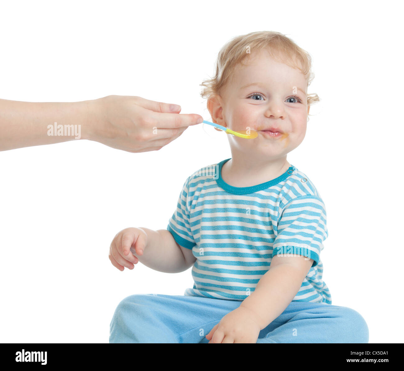 happy child additional feeding Stock Photo - Alamy