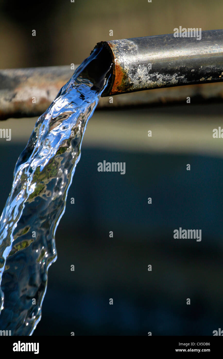 Water flowing from pipe hi-res stock photography and images - Alamy
