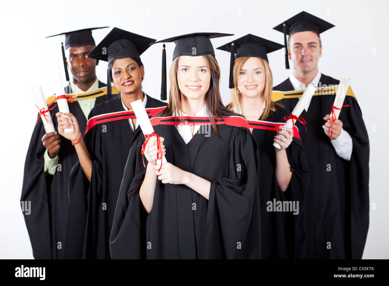 group of international graduates on white background Stock Photo - Alamy