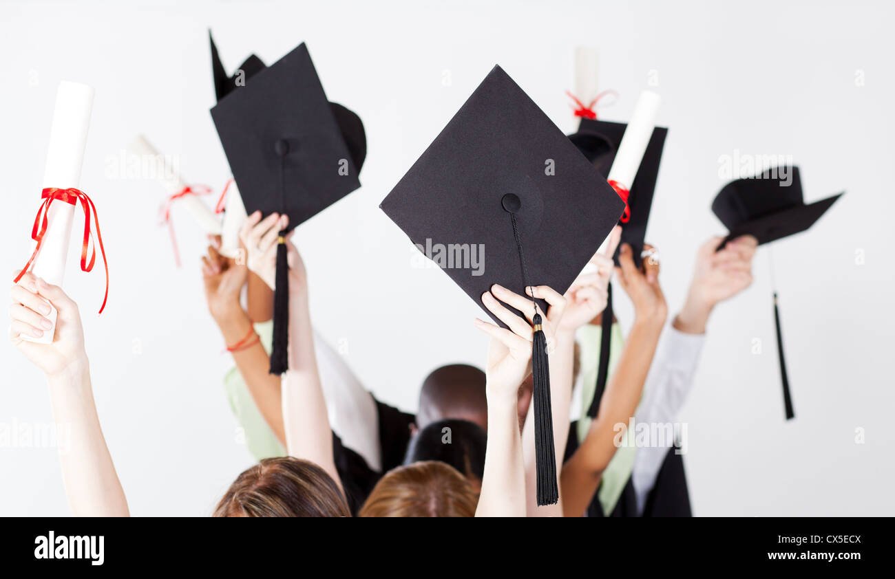 graduate holding graduation caps and certificate Stock Photo - Alamy