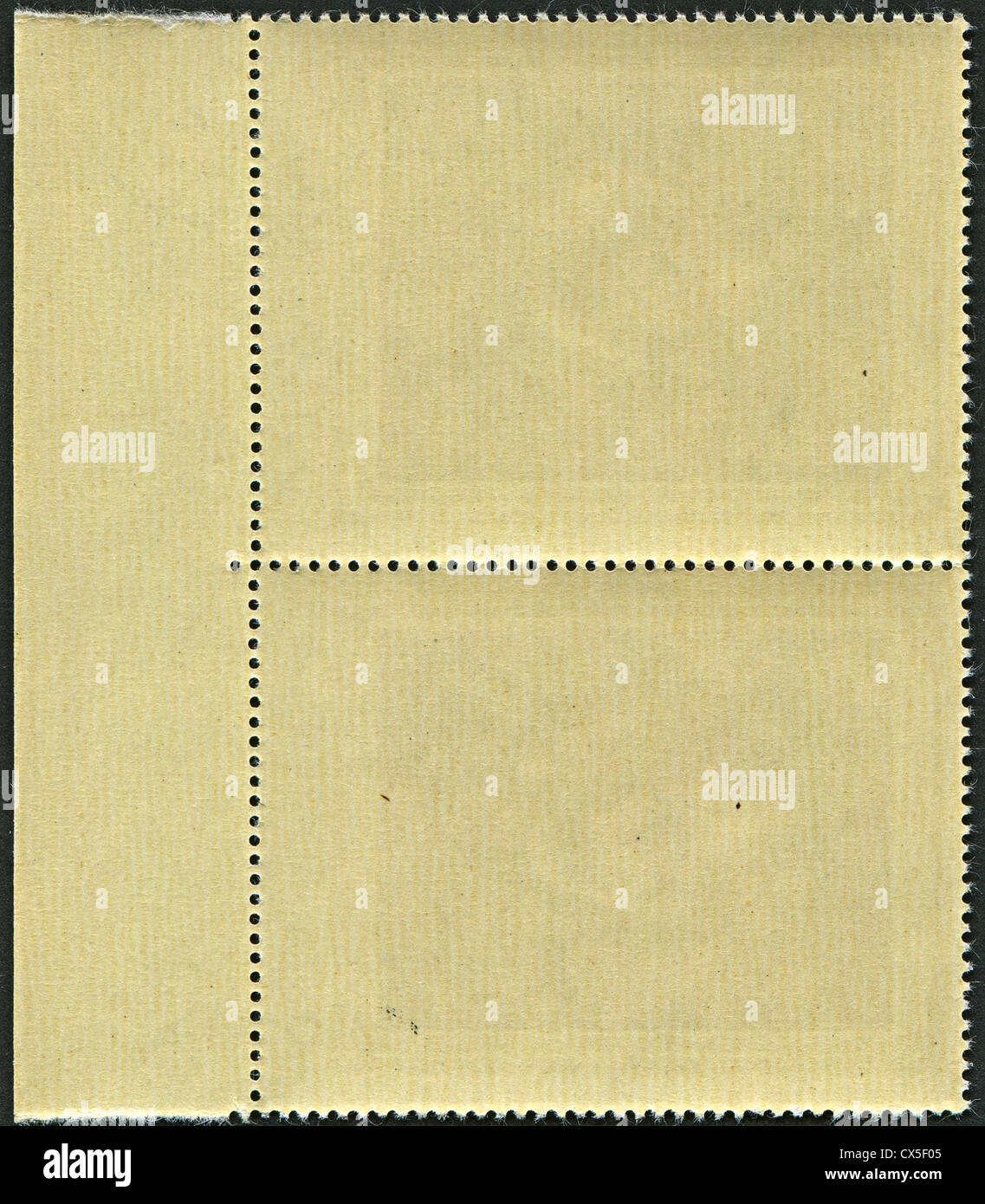 The reverse side of a postage stamp Stock Photo - Alamy