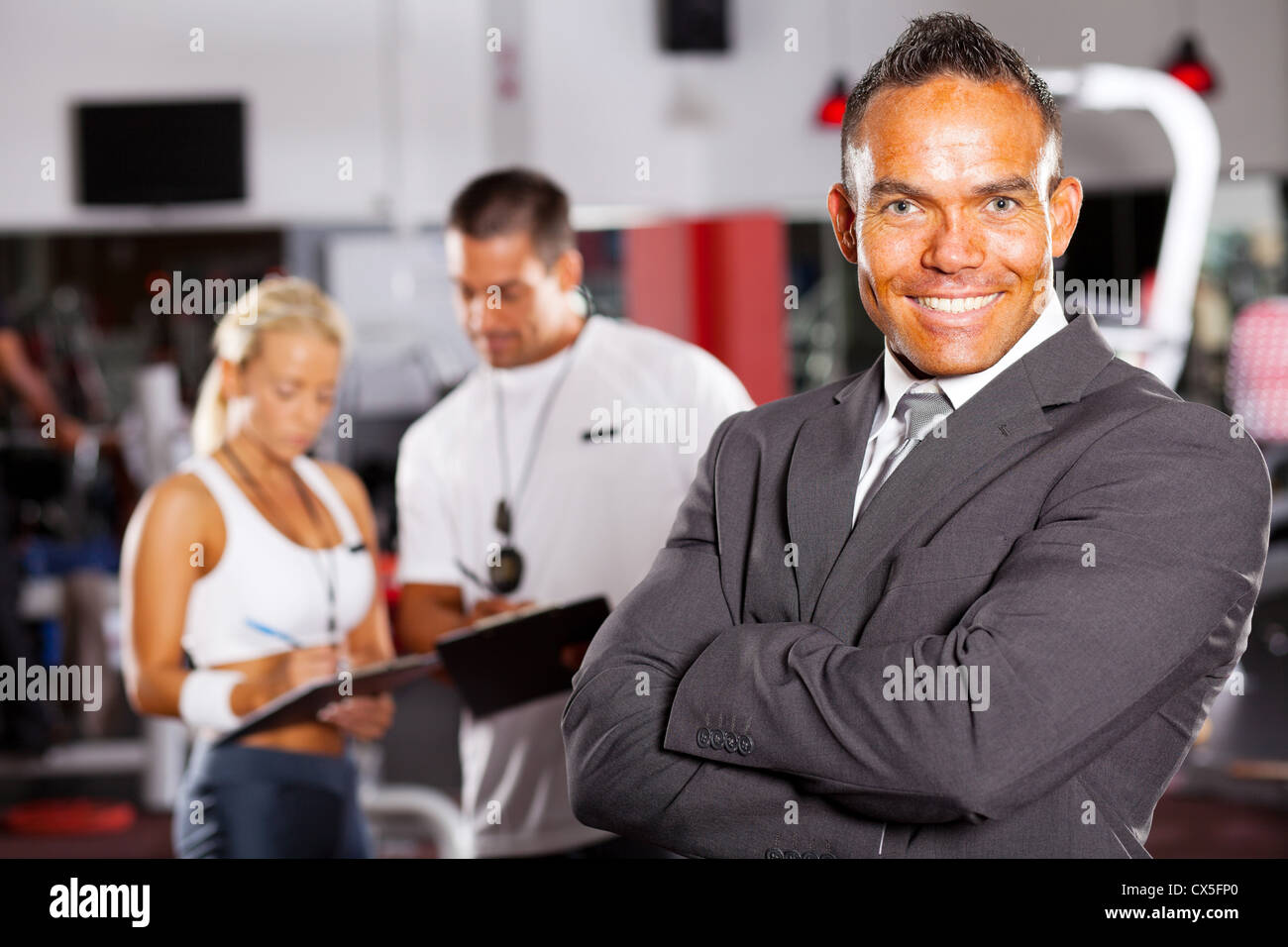 confident male gym manager portrait Stock Photo - Alamy