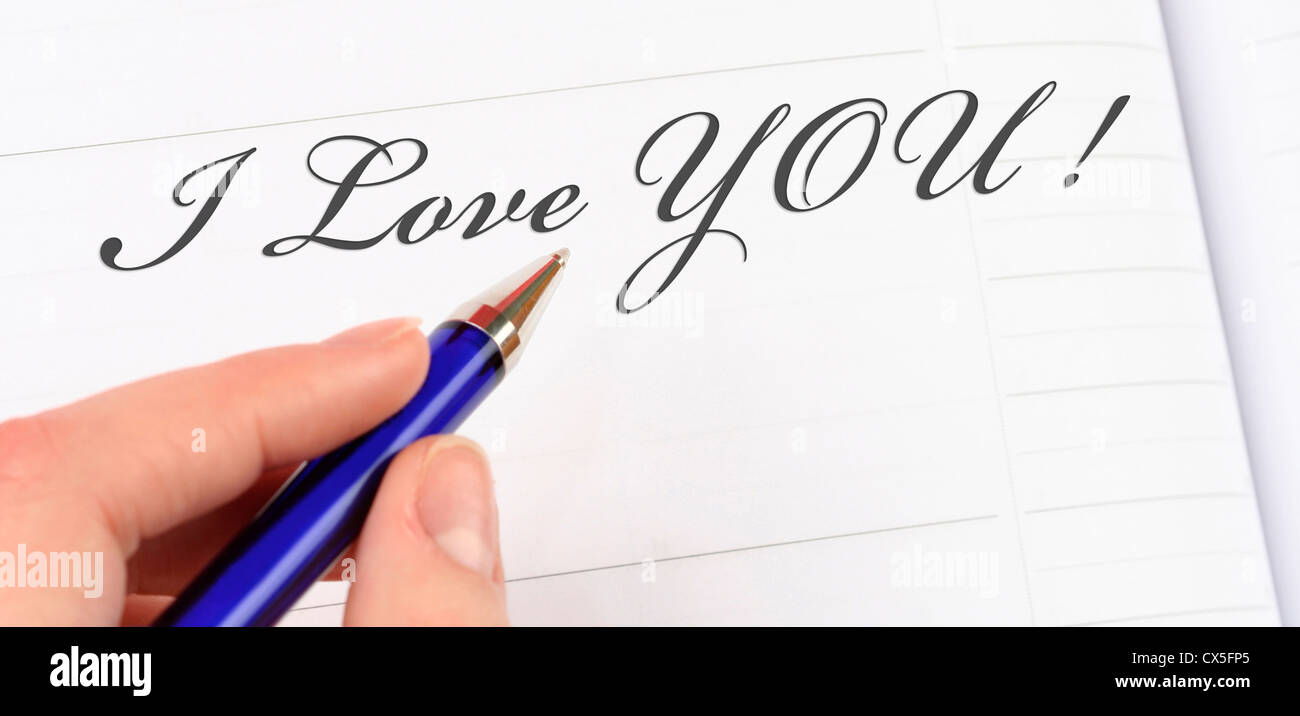 I love you note on a white paper Stock Photo - Alamy