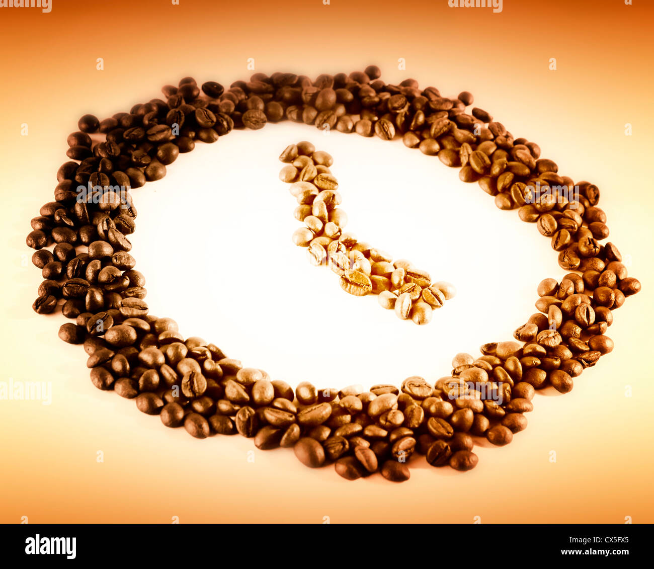 Clock made from coffee beans Stock Photo - Alamy