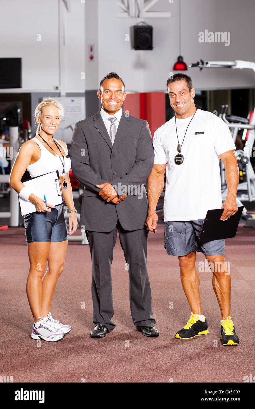 gym staff full length portrait Stock Photo - Alamy