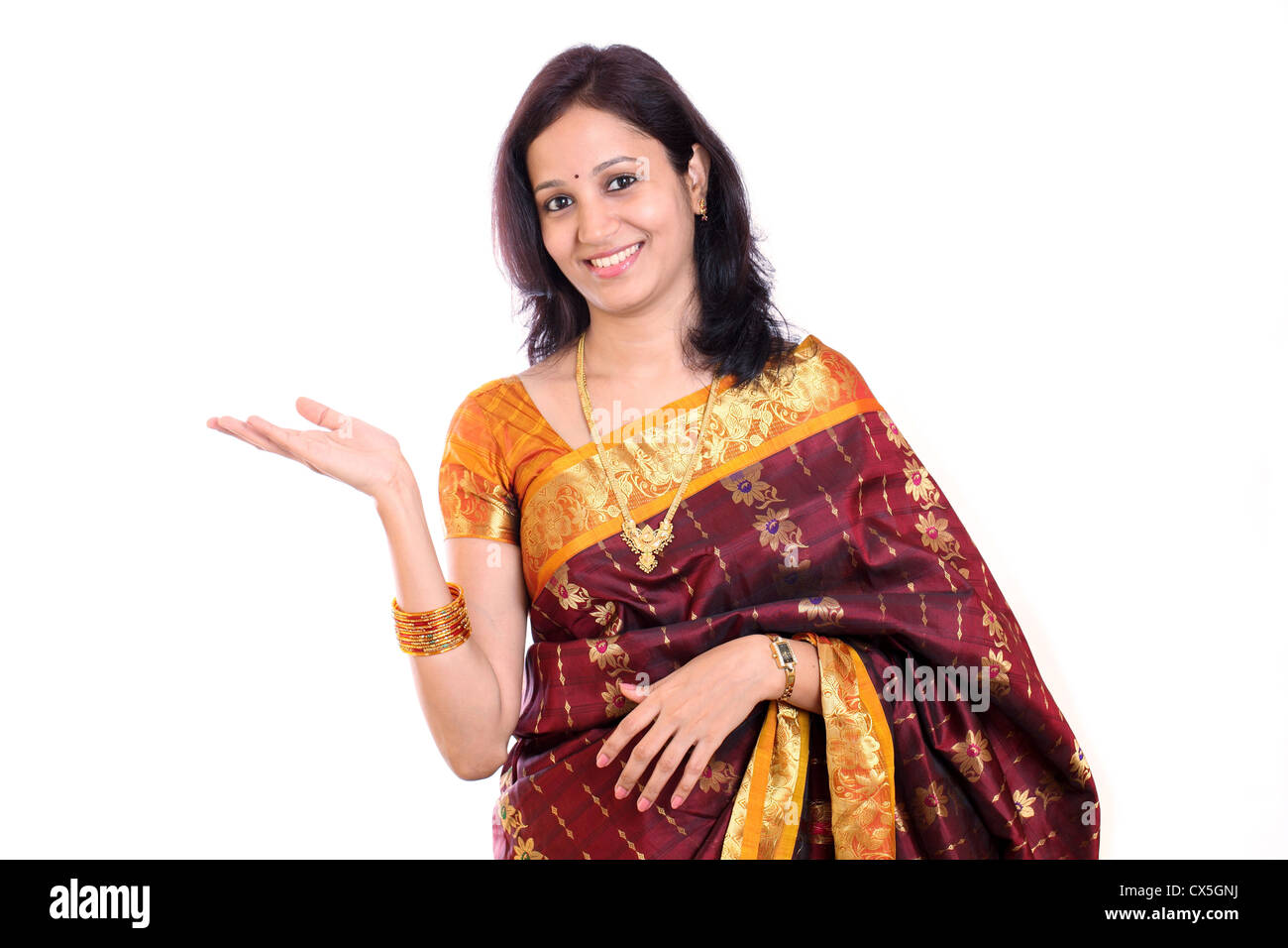 Traditional Indian woman showing open hand palm Stock Photo - Alamy