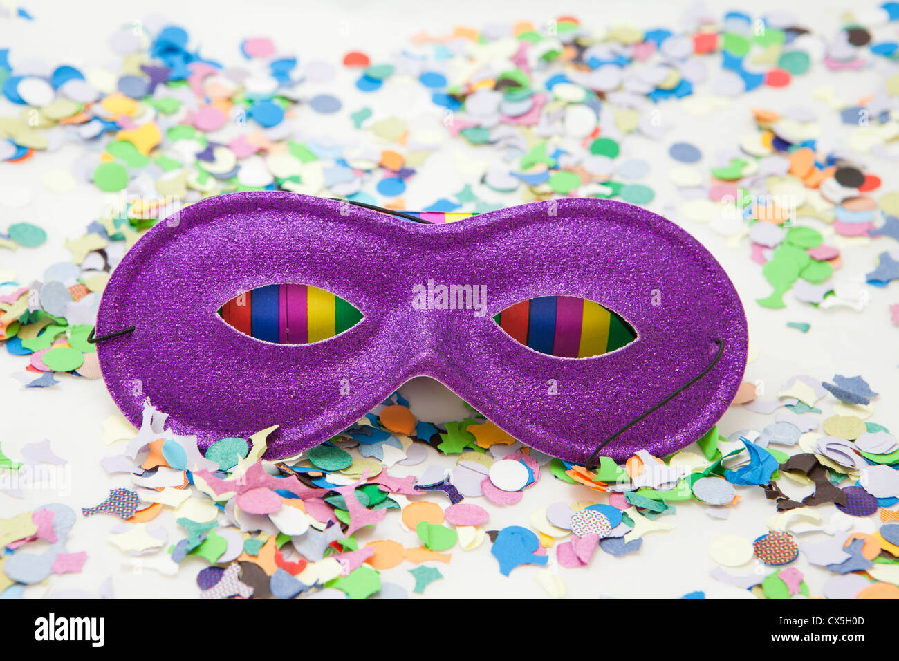 Colorful carnival background with stripes and mask Stock Photo - Alamy