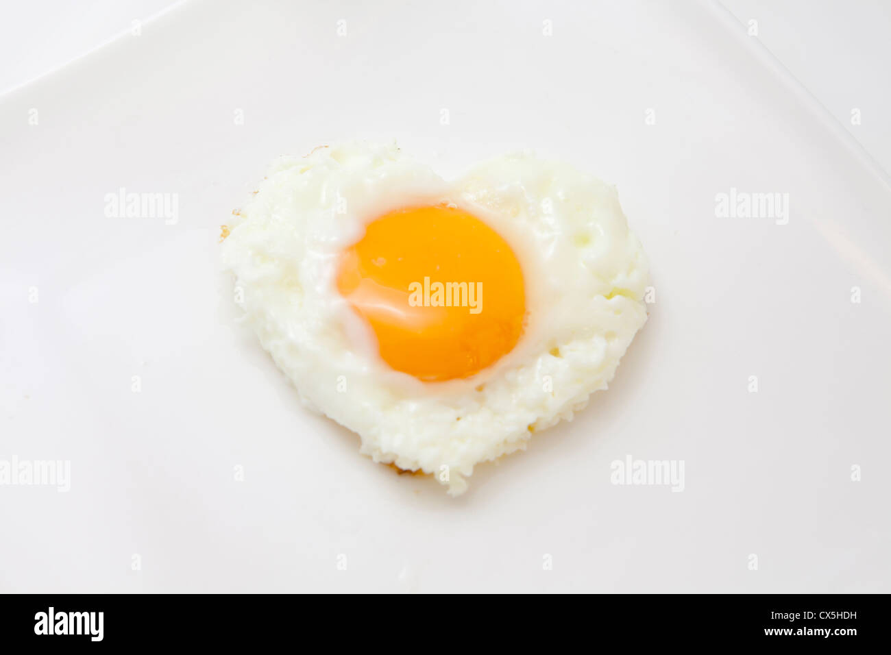 food background with fresh egg on white background Stock Photo - Alamy