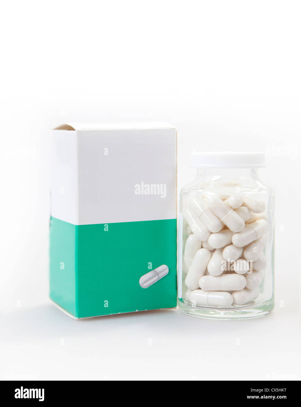 medical pills with a blanc pack on white background Stock Photo - Alamy
