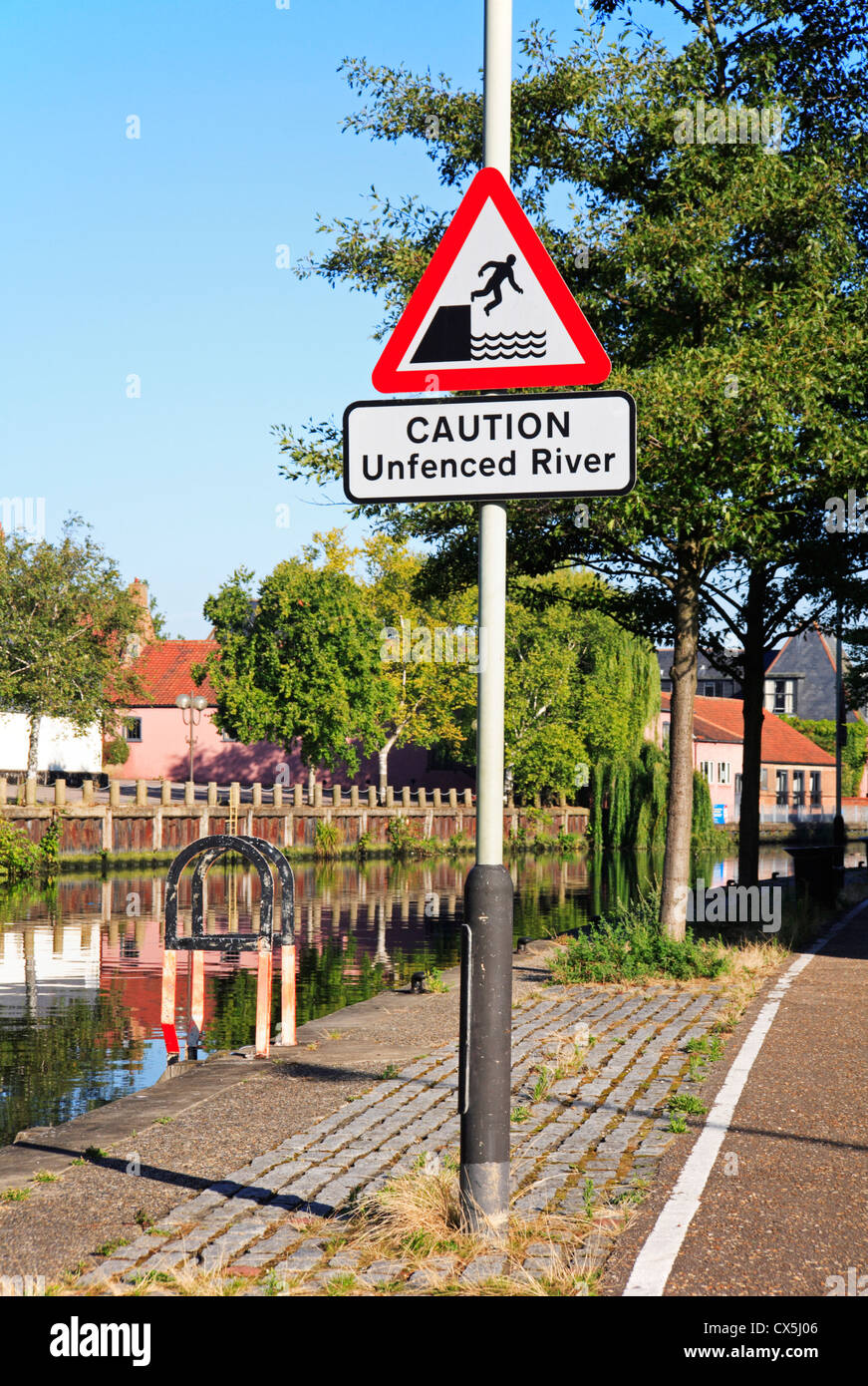 An Unfenced River warning sign by the River Wensum in Norwich, Norfolk ...
