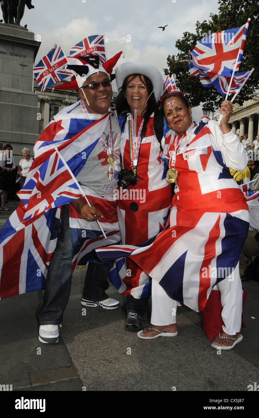 Olympic flags parade hi-res stock photography and images - Alamy