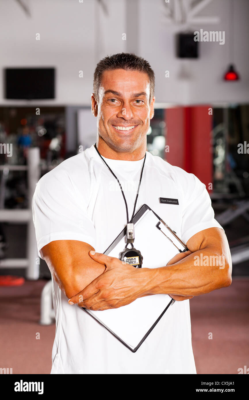 handsome professional gym instructor portrait Stock Photo - Alamy