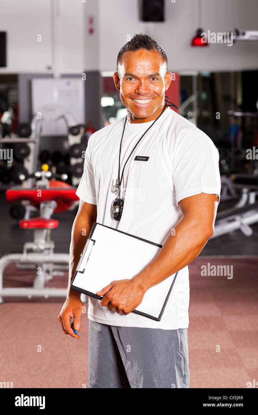 happy male gym instructor portrait Stock Photo - Alamy