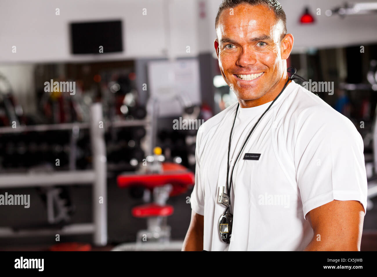 happy male gym instructor portrait Stock Photo - Alamy