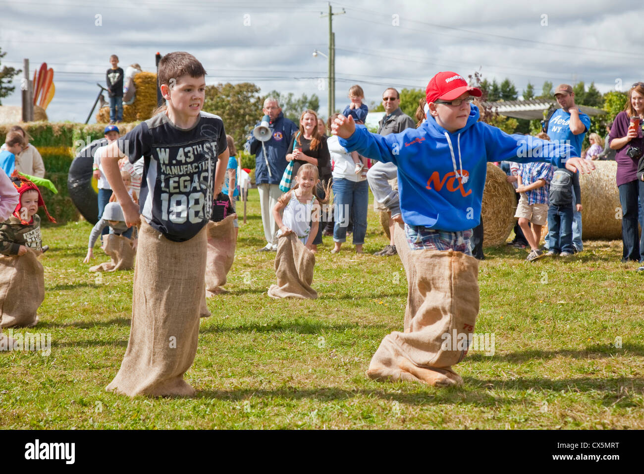 Kids in the potato sack race at the annual Scarecrow Festival held in ...