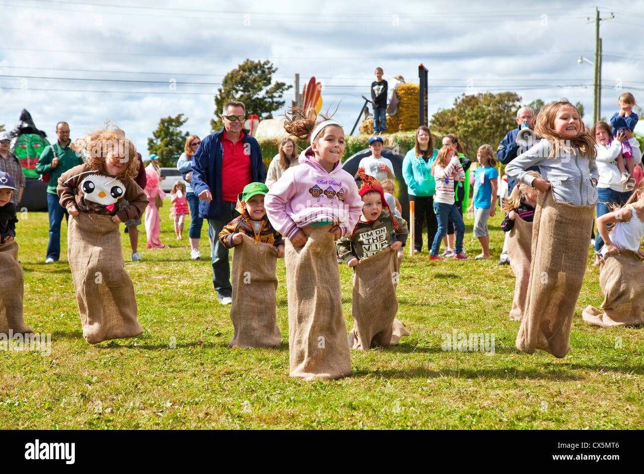 Kids in the potato sack race at the annual Scarecrow Festival held in ...