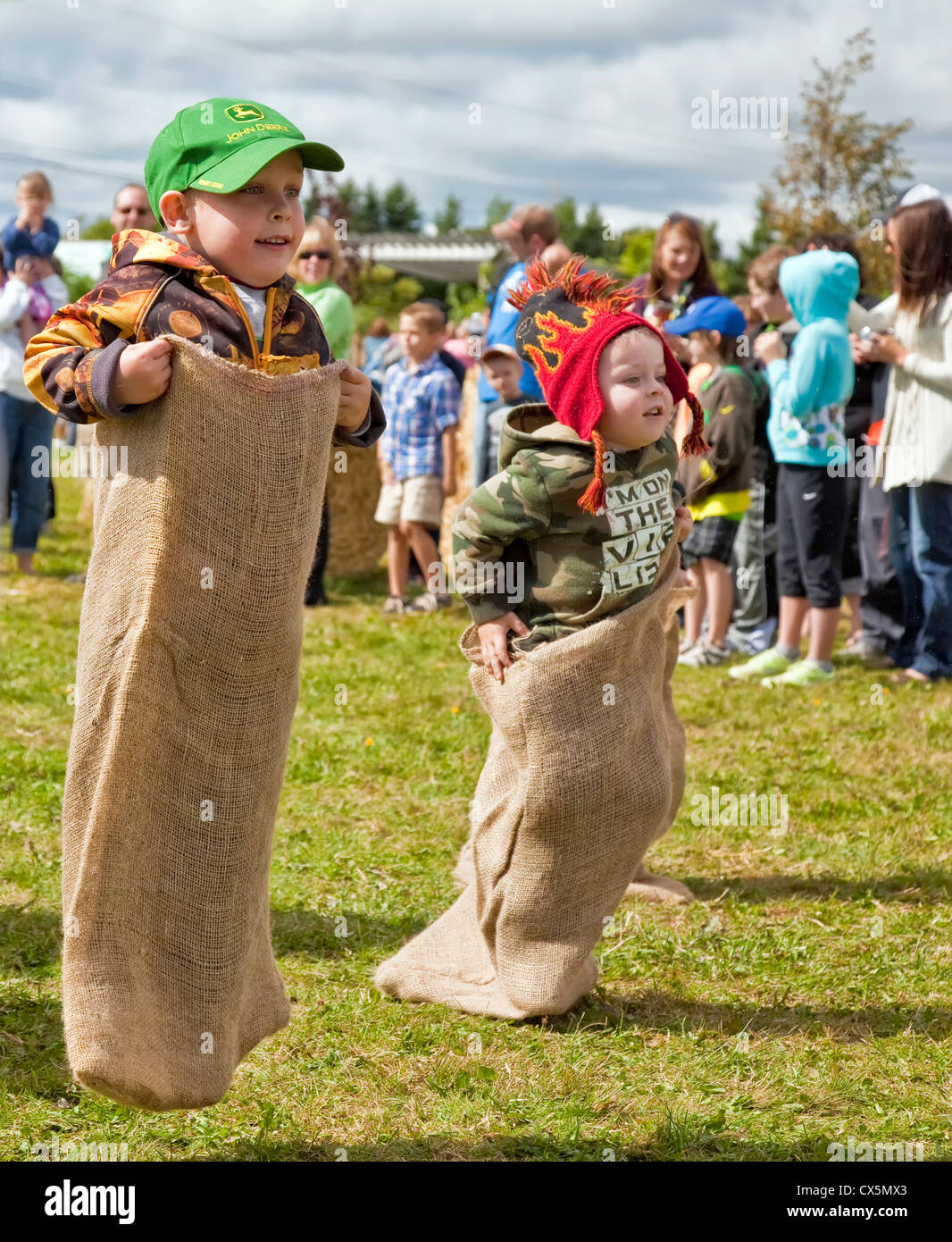 Kids in the potato sack race at the annual Scarecrow Festival held in ...