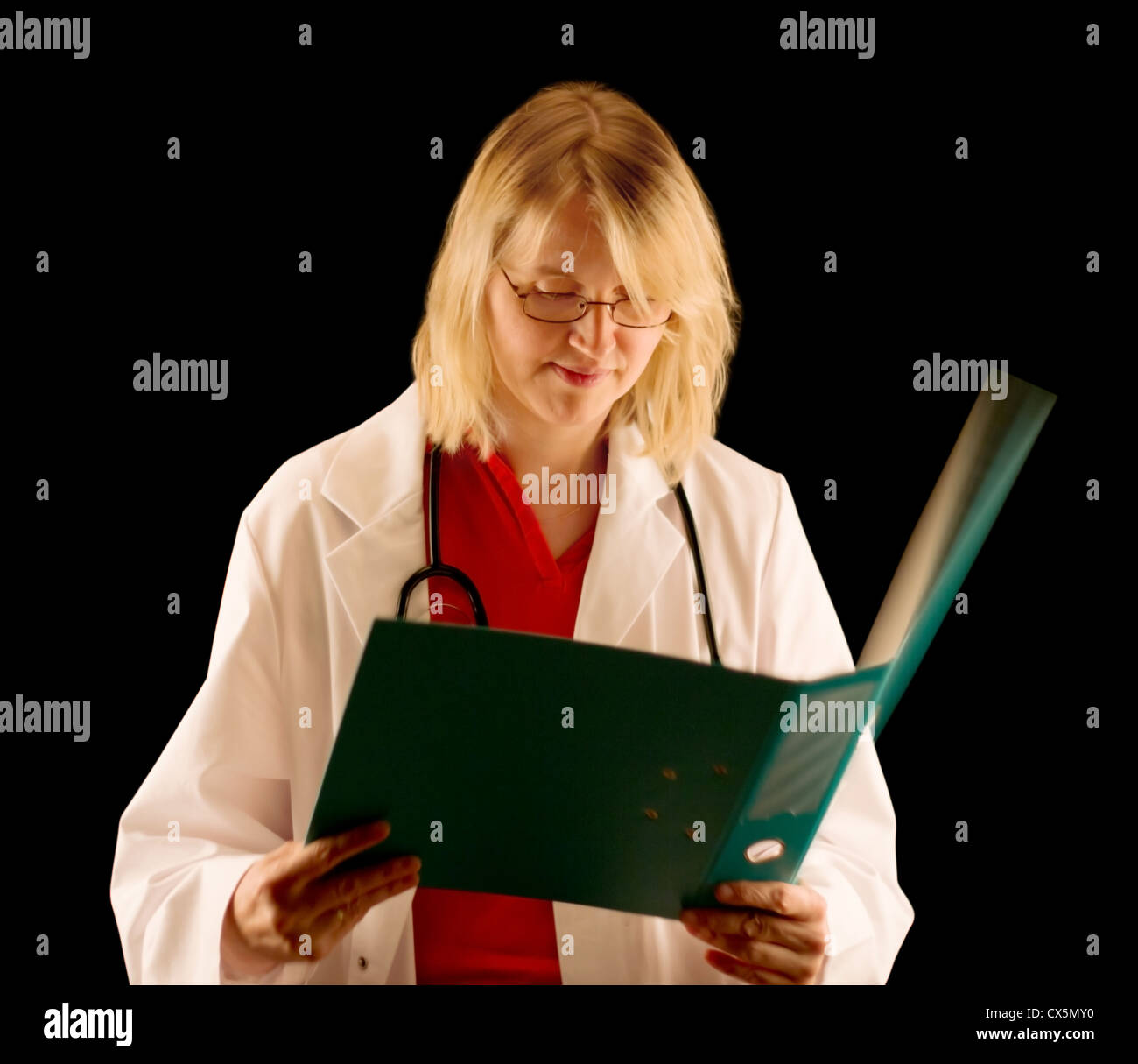 Medical doctor with documents about a patient Stock Photo - Alamy