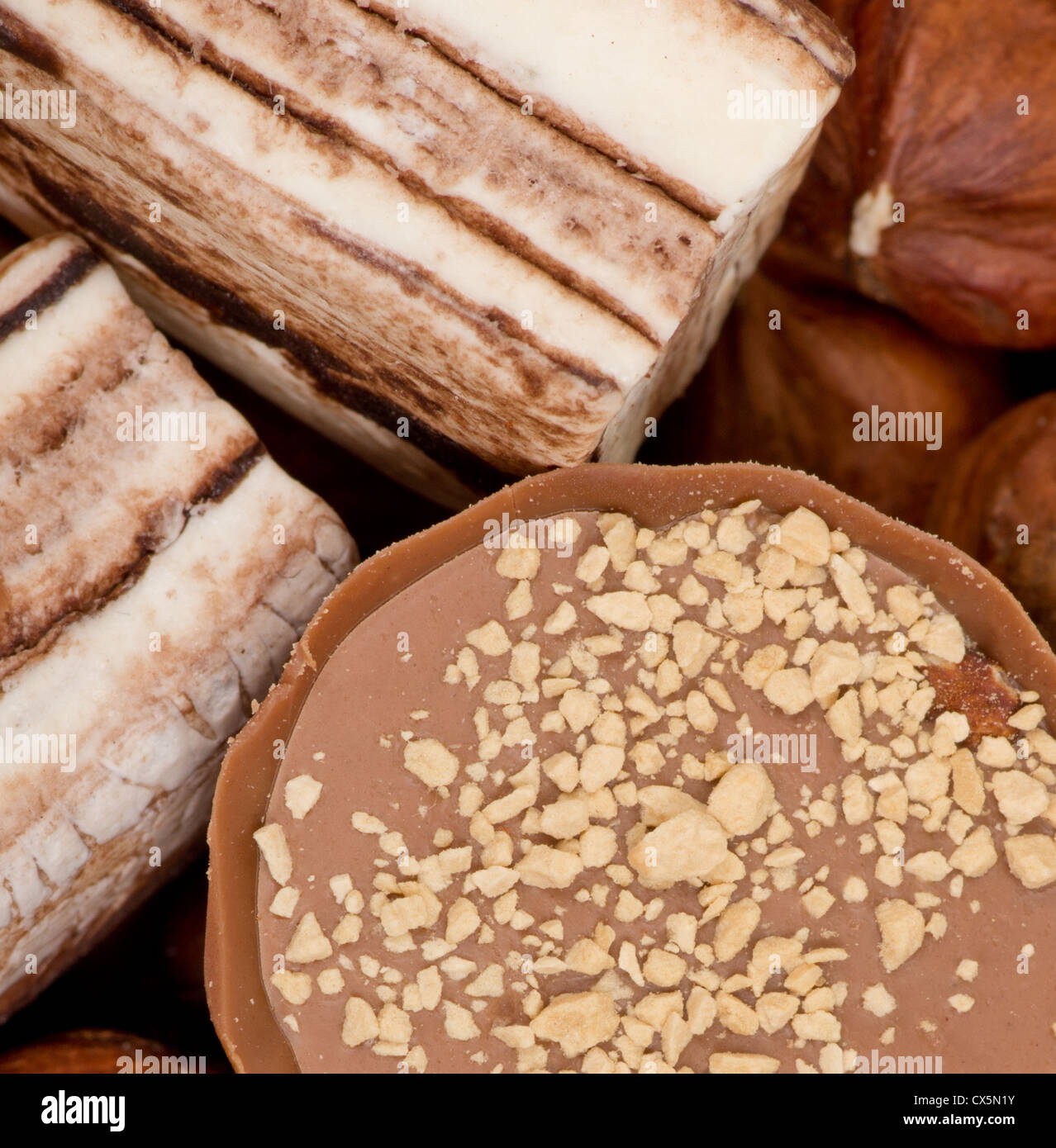 Closeup of coffee beans, cinnamon and nuts Stock Photo - Alamy