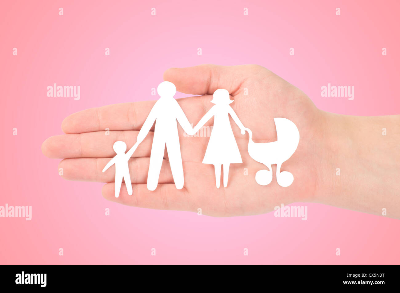 Paper family in hands Stock Photo - Alamy