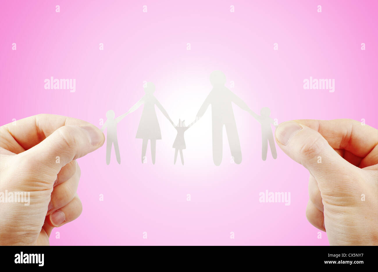 paper family in hands Stock Photo - Alamy