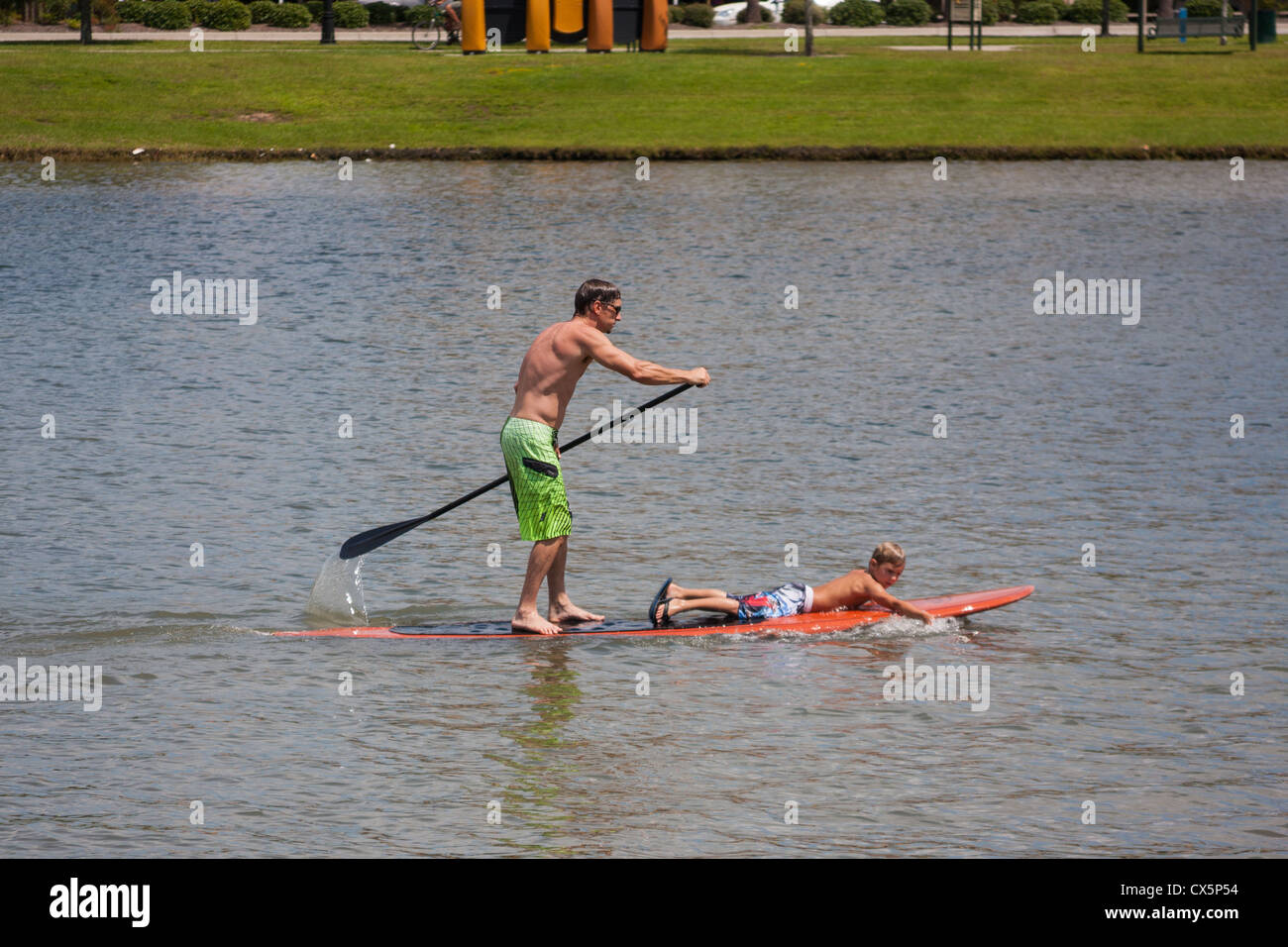 Paddleboarding On The Lake Stock Photo - Alamy