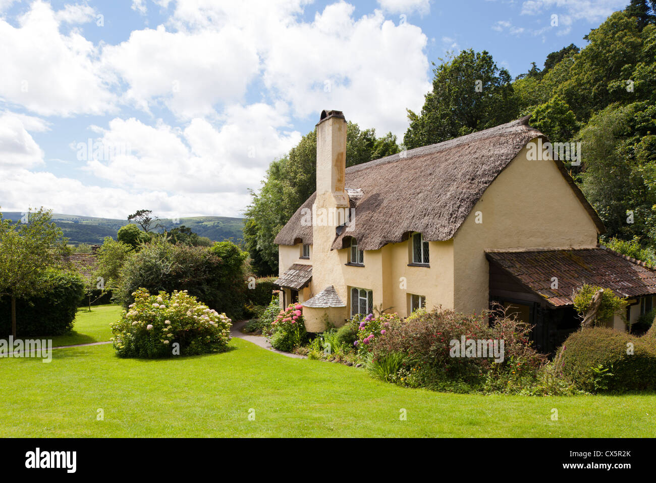 Thatched cottage on Selworthy Green in the Exmoor village of Selworthy ...