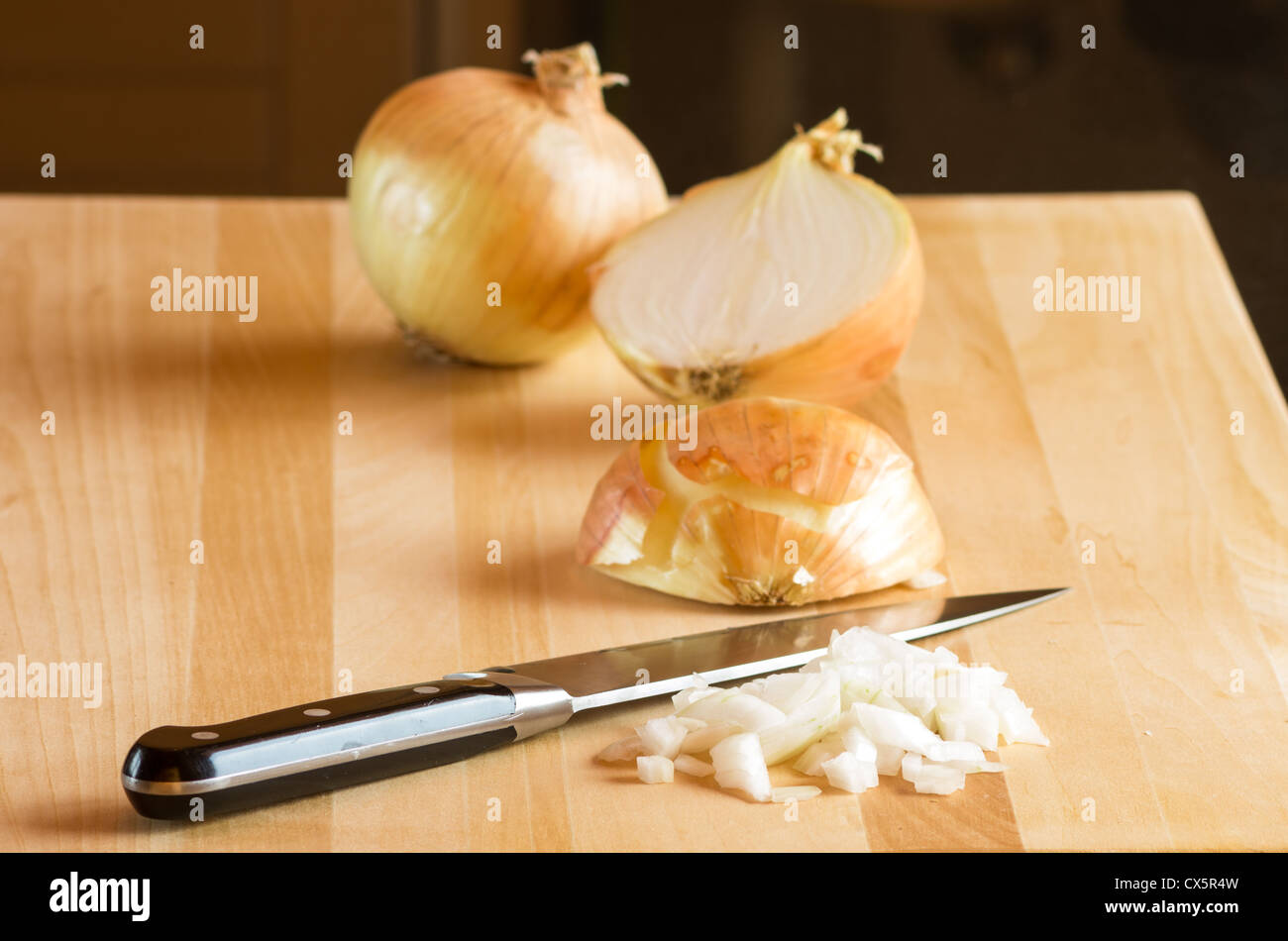 Home cook slicing onions hi-res stock photography and images - Alamy