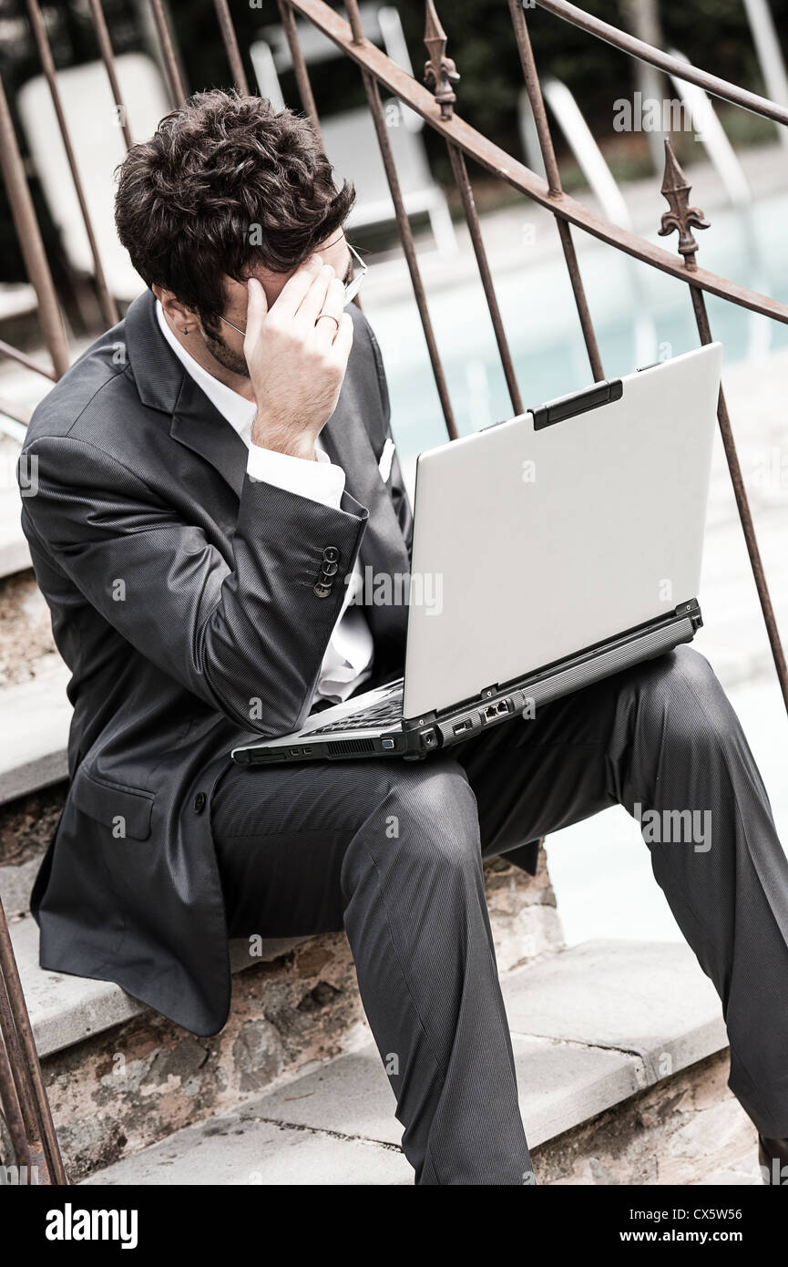 Overworking man hi-res stock photography and images - Alamy
