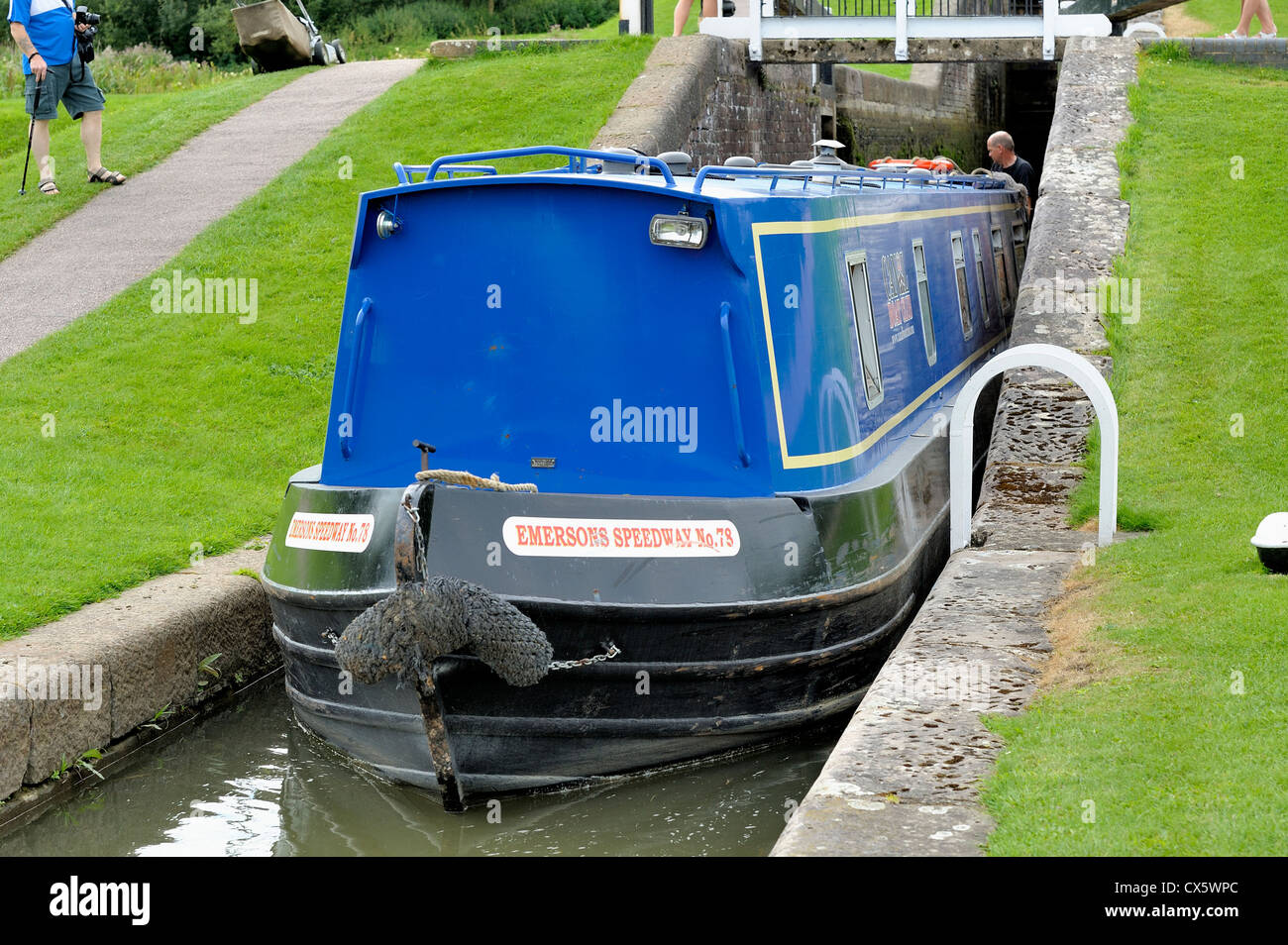 A blue narrow boat moving through foxton locks leicestershire england ...