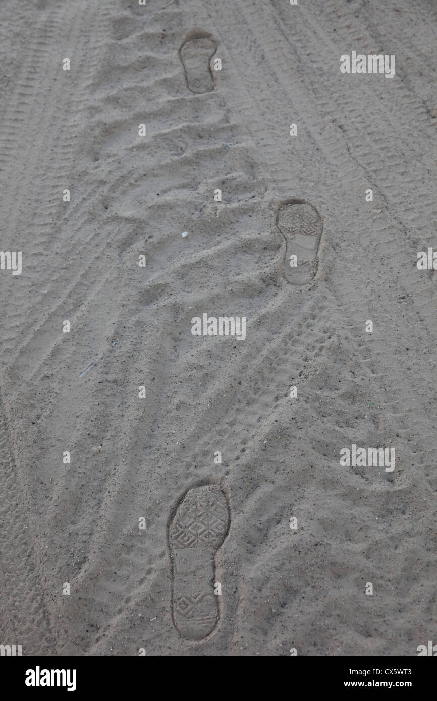 Human trace of a foot on sand Stock Photo - Alamy