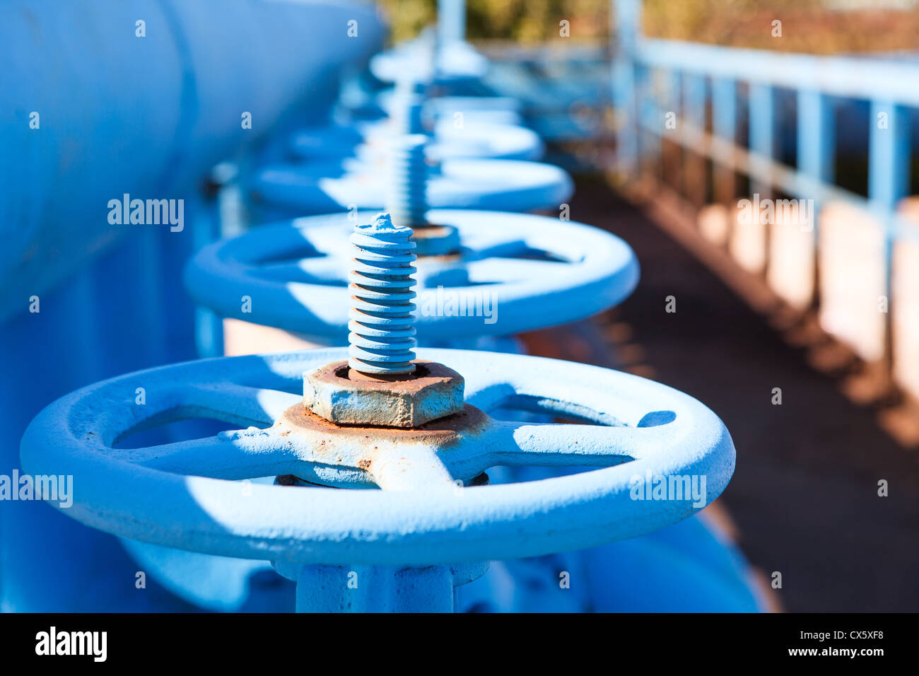 Close up of line from blue vents of oxygen gate valves Stock Photo - Alamy