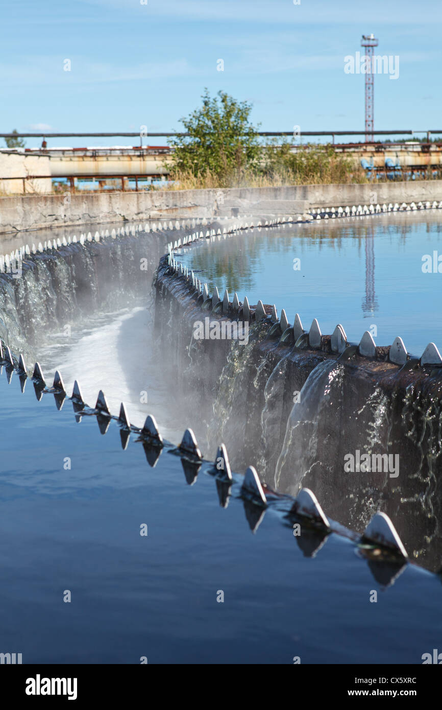Sewage treatment factory with water overflowing from recycling ...
