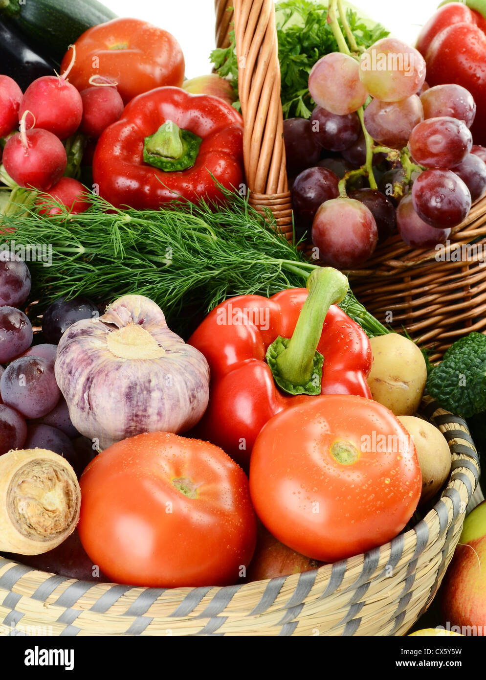 Composition with raw vegetables and wicker basket Stock Photo - Alamy