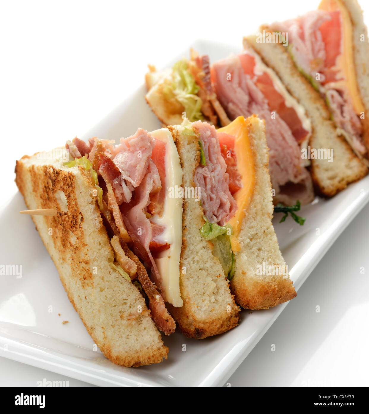 Club Sandwich With Ham And Bacon Stock Photo - Alamy