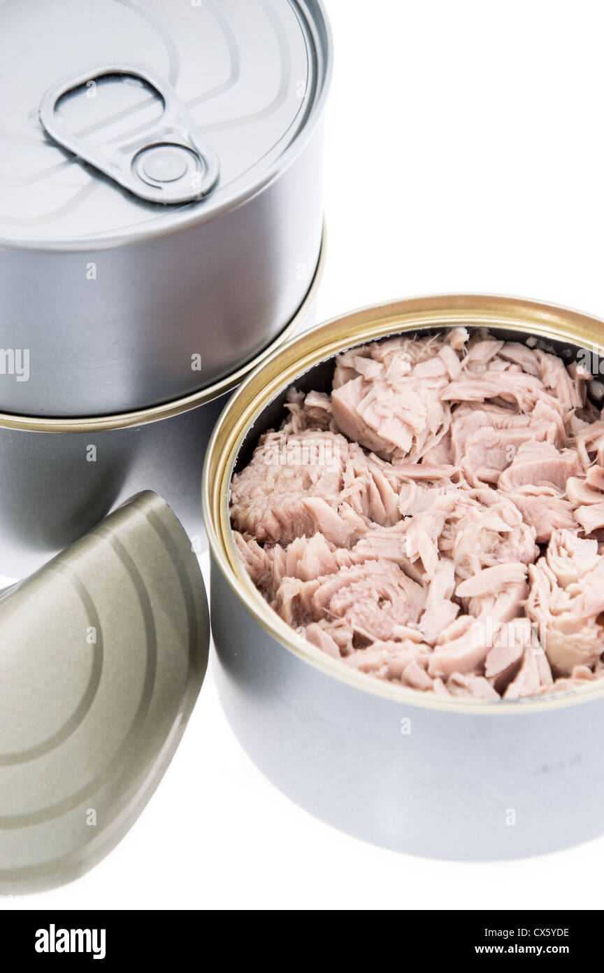 Some Cans with Tuna fish isolated on white Stock Photo - Alamy