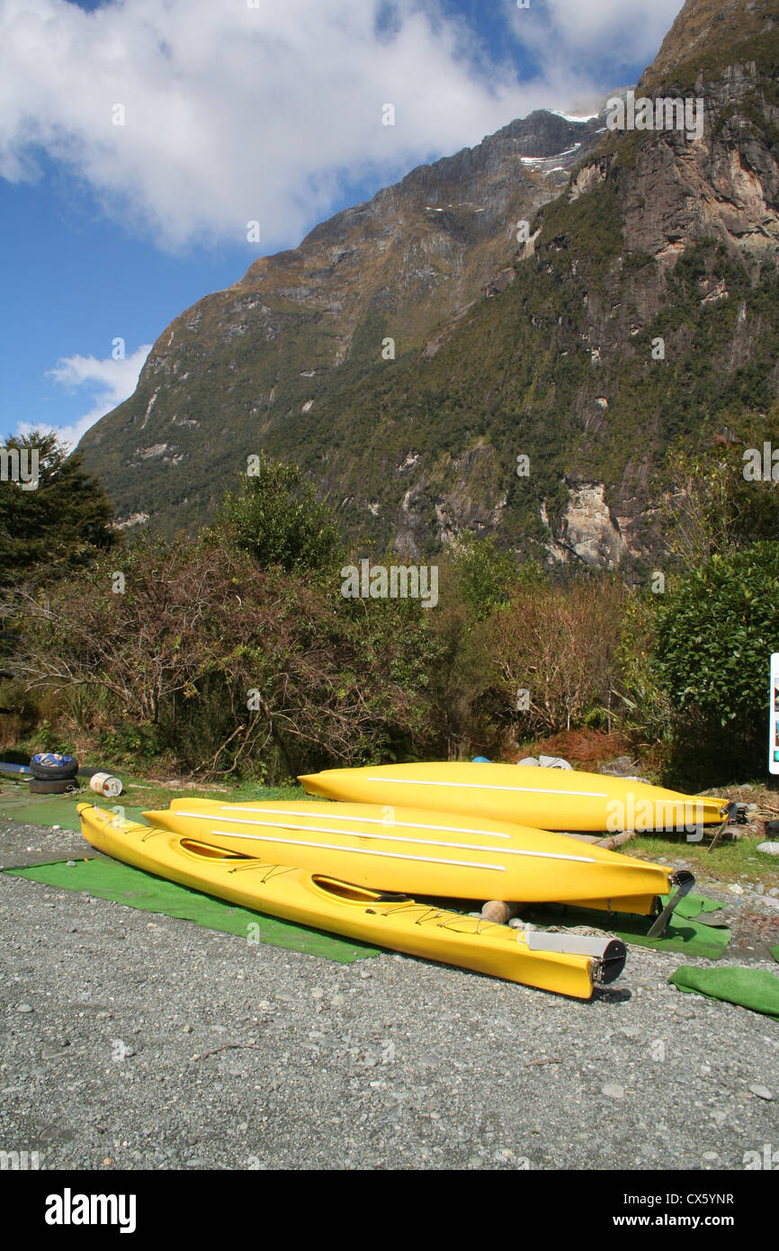 Yellow canoes in New Zealand Stock Photo - Alamy