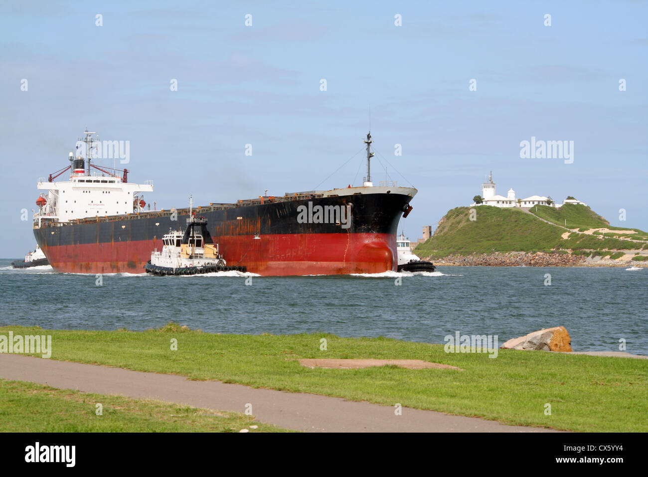 Ship entering Newcastle harbor. Australia Stock Photo - Alamy
