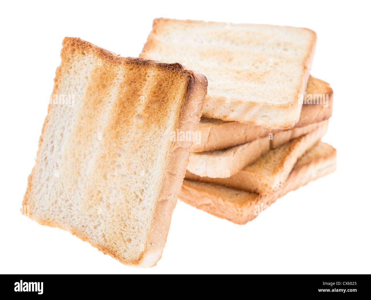 Heap of toasted bread isolated on white background Stock Photo - Alamy