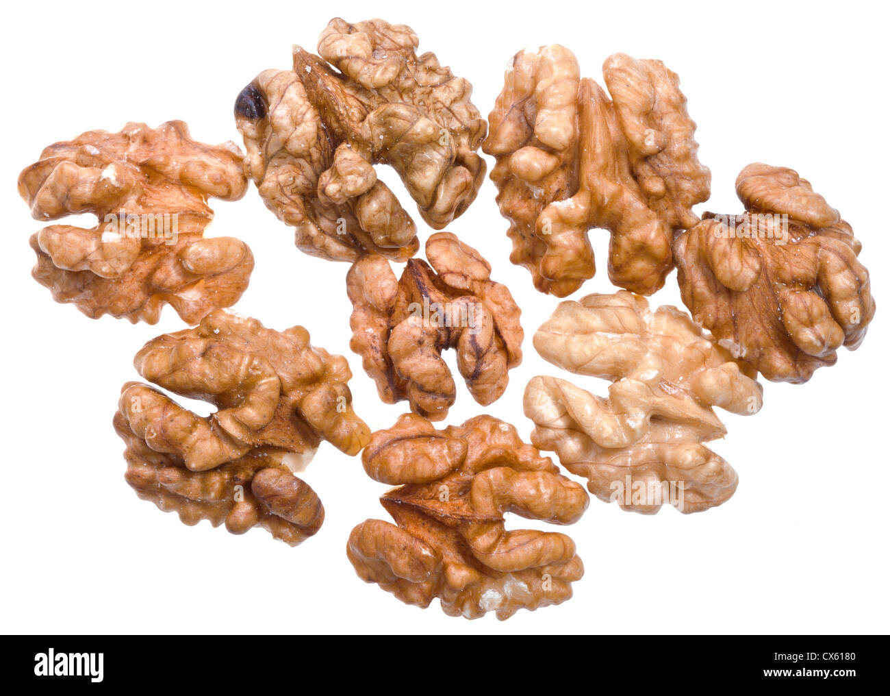 several peeled walnut kernels isolated on white background Stock Photo ...