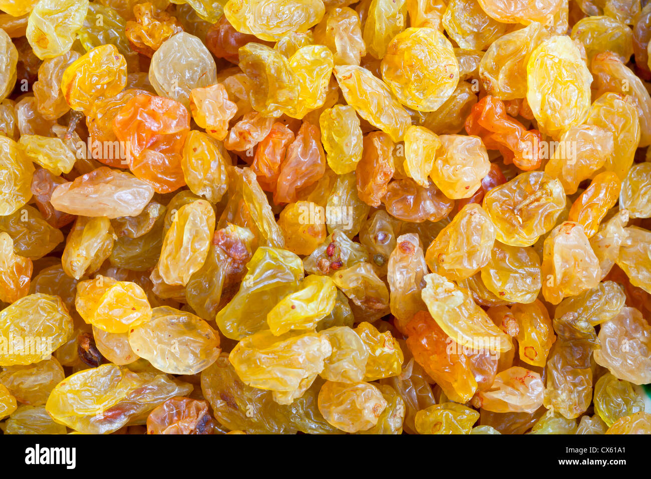 background from sultana raisins close up Stock Photo - Alamy