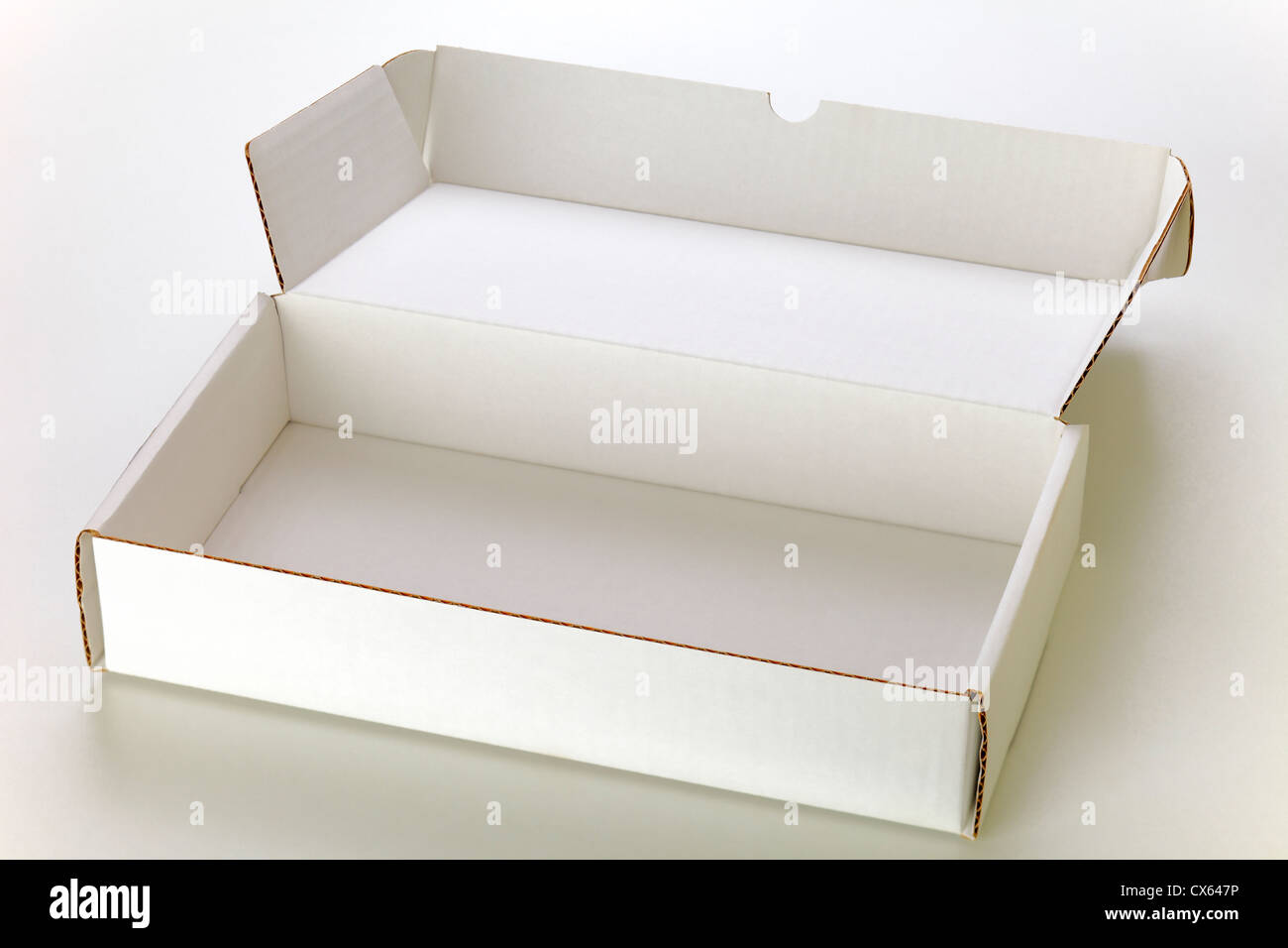 A open white cardboard box isolated on grey background Stock Photo - Alamy