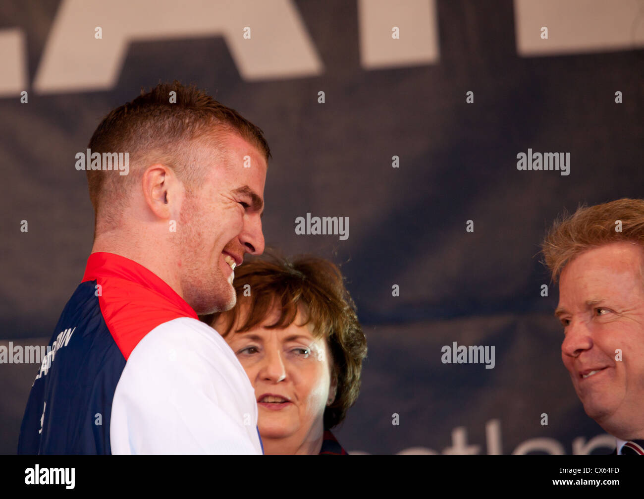 Peter Kirkbride, Scottish weightlifting Olympian, being congratulated ...