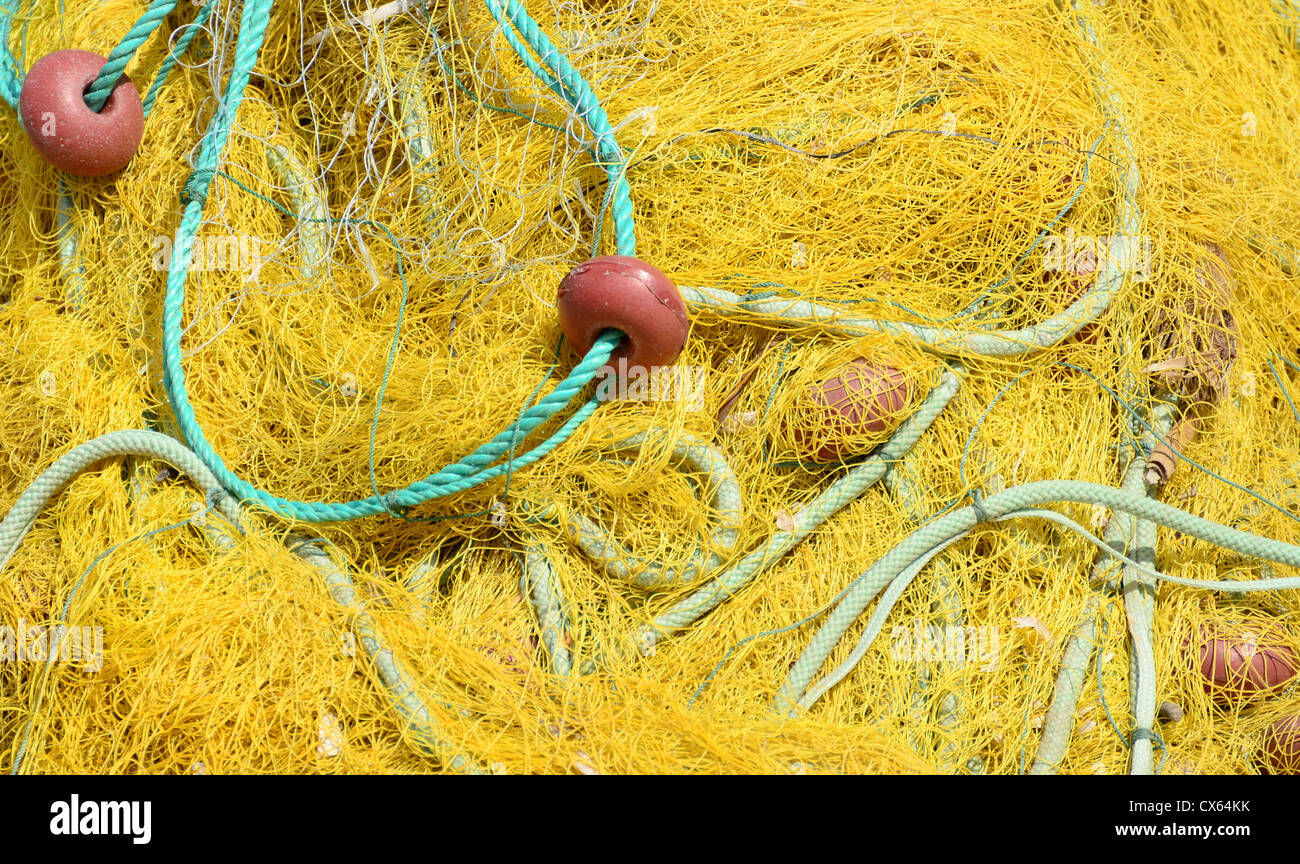 Yellow fishing net texture Stock Photo - Alamy