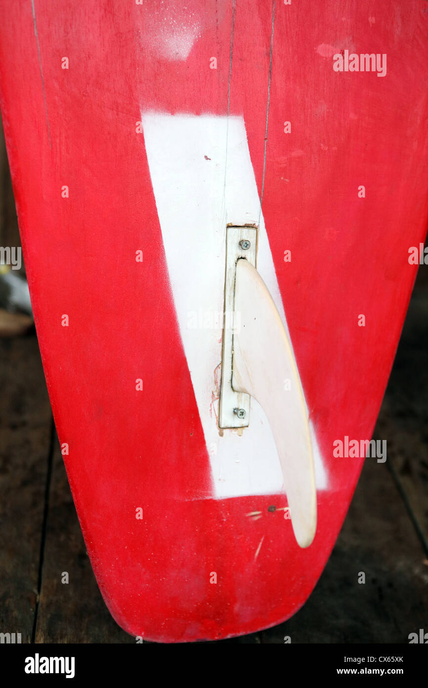 Closeup detail of red wooden single fin surfboard Stock Photo - Alamy