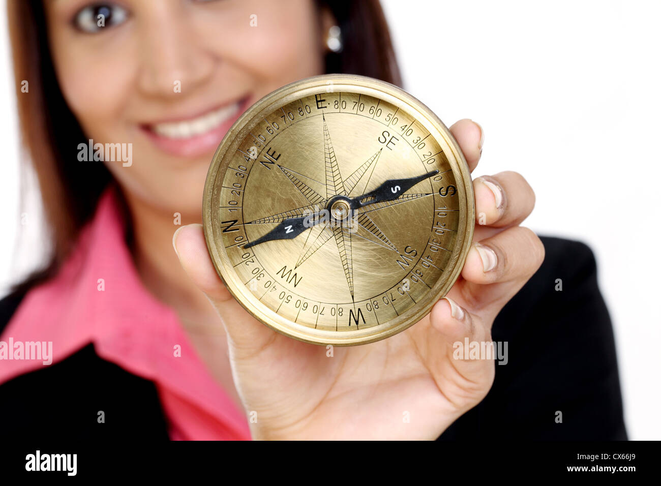 Indian Business woman holding a compass Stock Photo - Alamy
