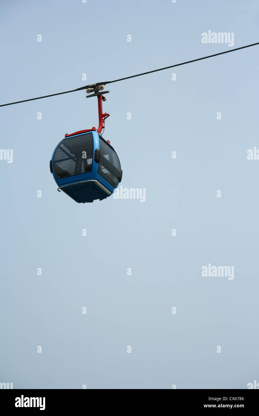 Blue empty cable car in Ancol recreation area, Jakarta Stock Photo - Alamy