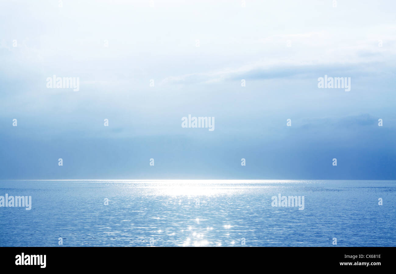 Beautiful Blue Seascape With The Sun Glittering Water Stock Photo - Alamy