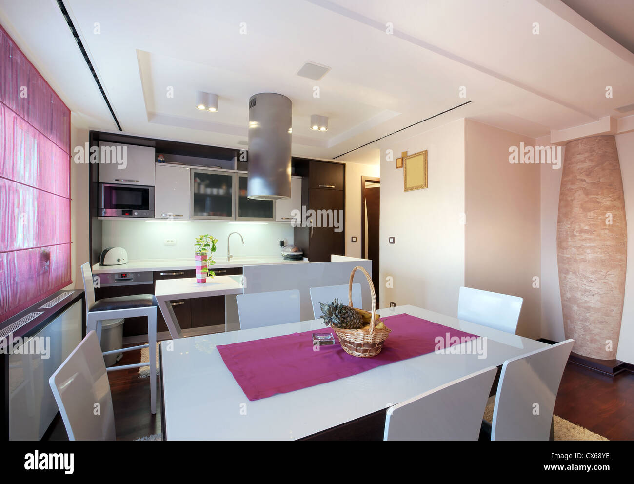 Interior of a modern home, view on dining room and kitchen Stock Photo ...